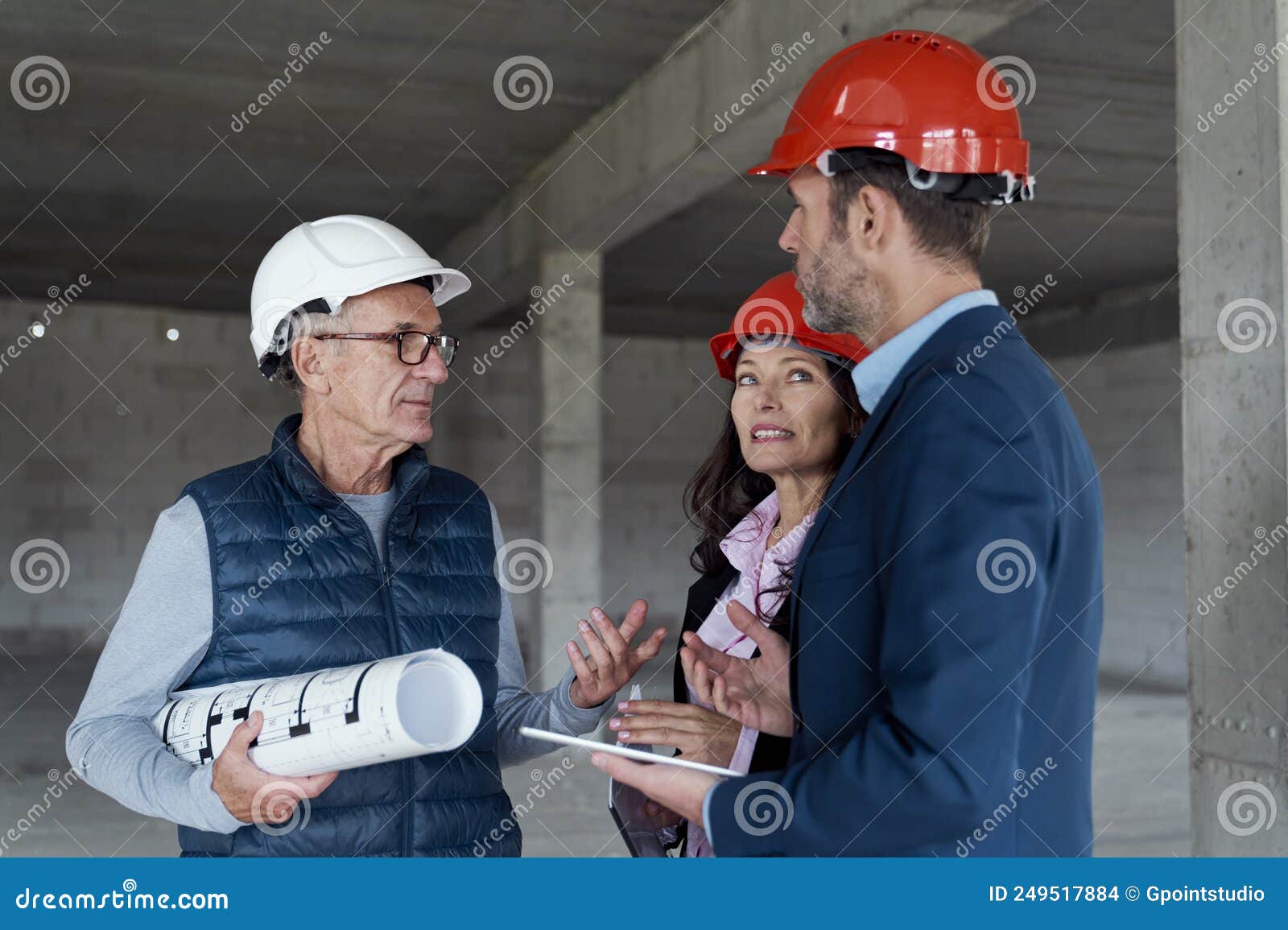 Working Engineers on the Construction Site Stock Photo - Image of ...