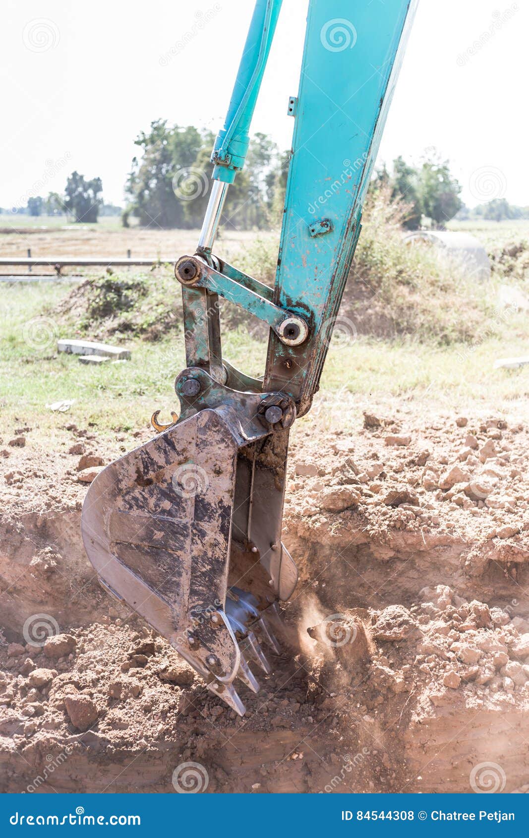 Working Excavator Tractor Digging a Trench. Stock Photo - Image of ...