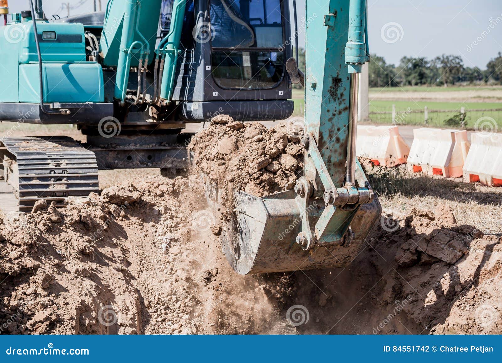 Working Excavator Tractor Digging a Trench. Stock Photo - Image of ...