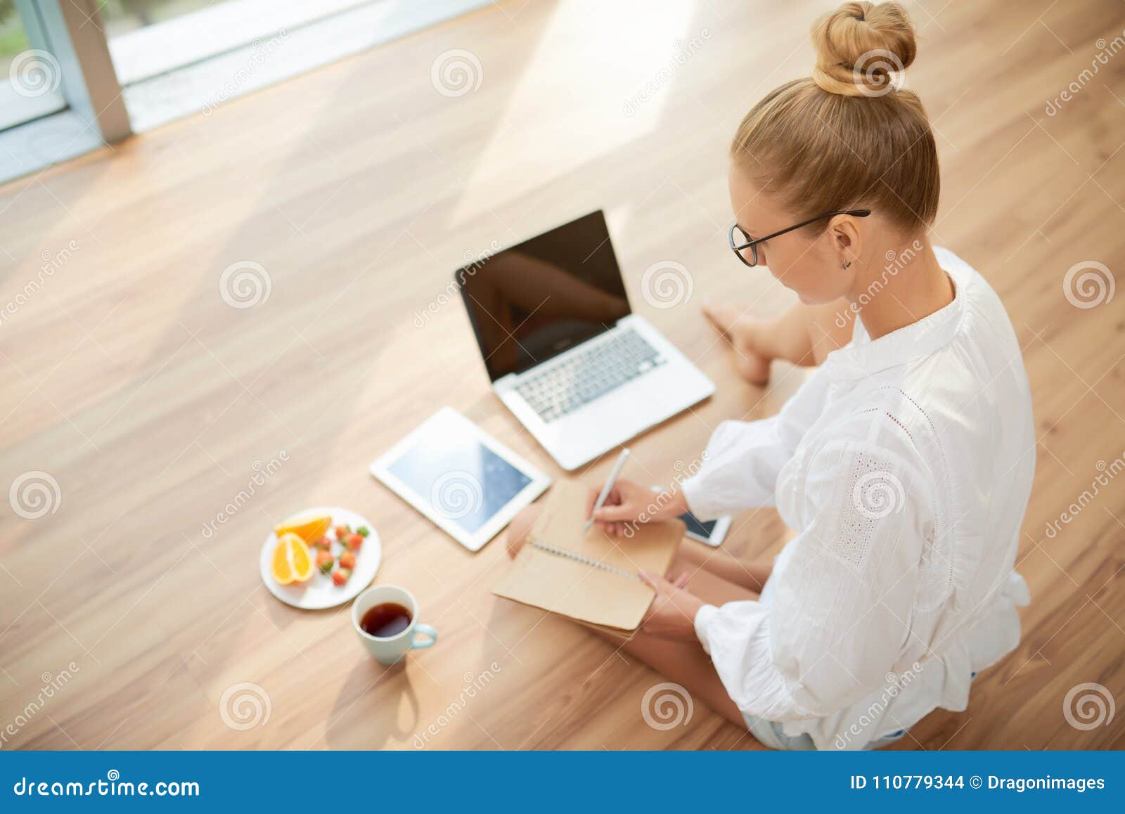 Working freelancer stock photo. Image of floor, laptop - 110779344