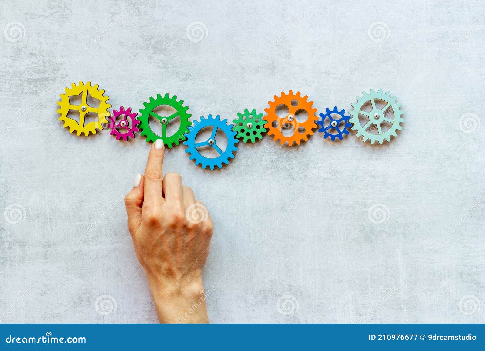 Working Gears Mechanism in Hand. Teamwork Concept. Top View Stock Image ...