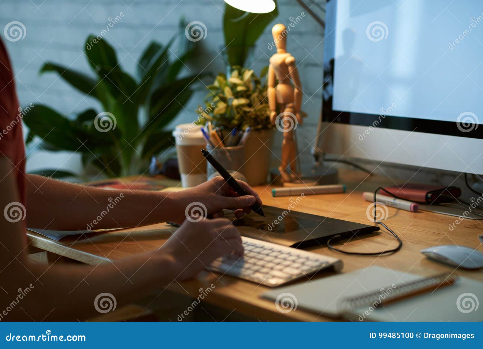 Working graphic designer stock photo. Image of computer - 99485100