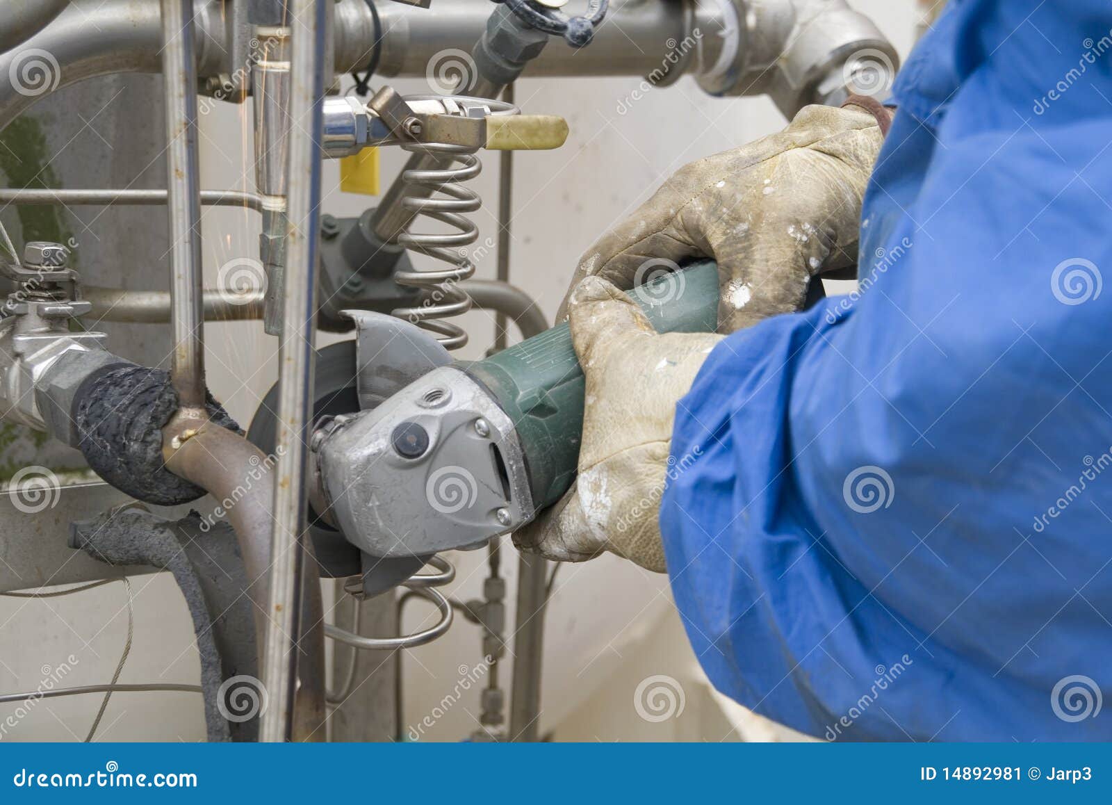 Working with the grinder stock image. Image of cutting - 14892981