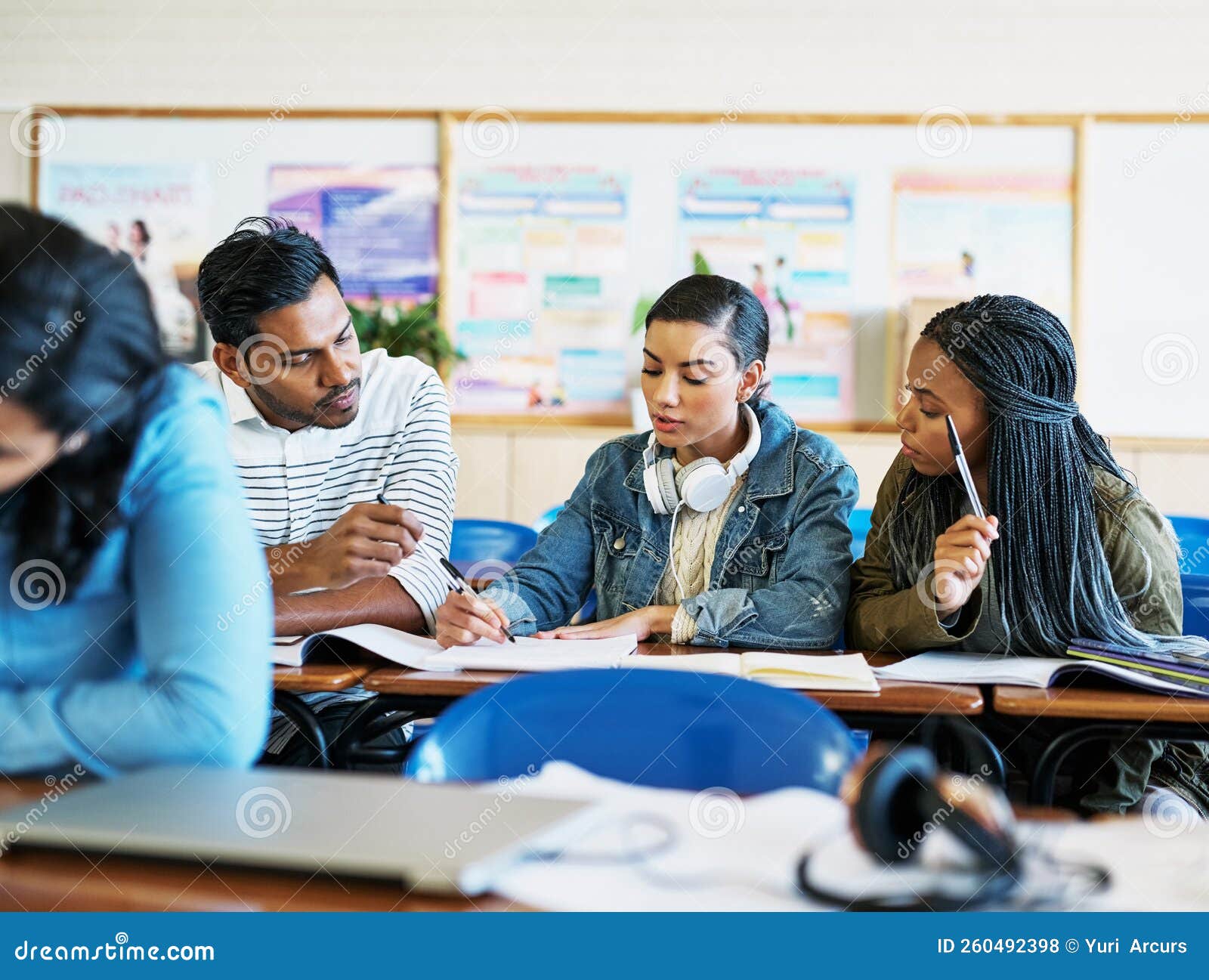 Working on a Group Project. a Group of Young University Students ...