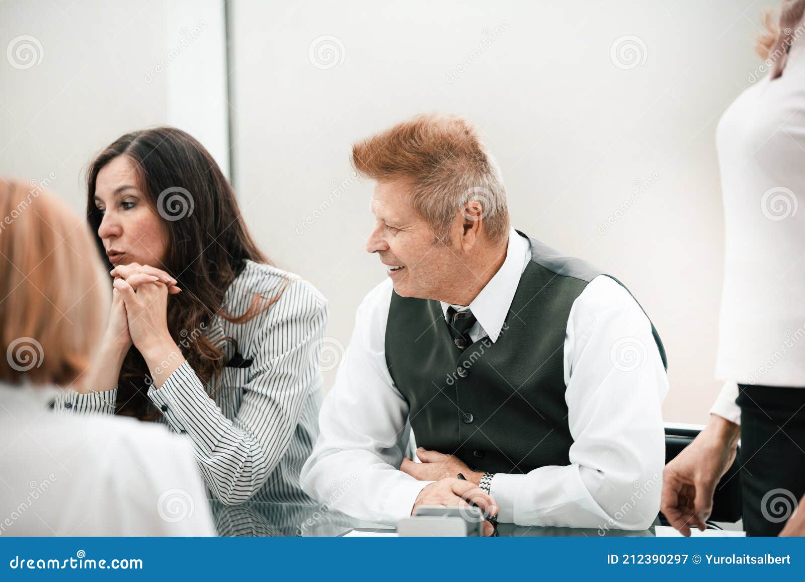 Working Group Sitting at a Table in the Conference Room. Stock Image ...