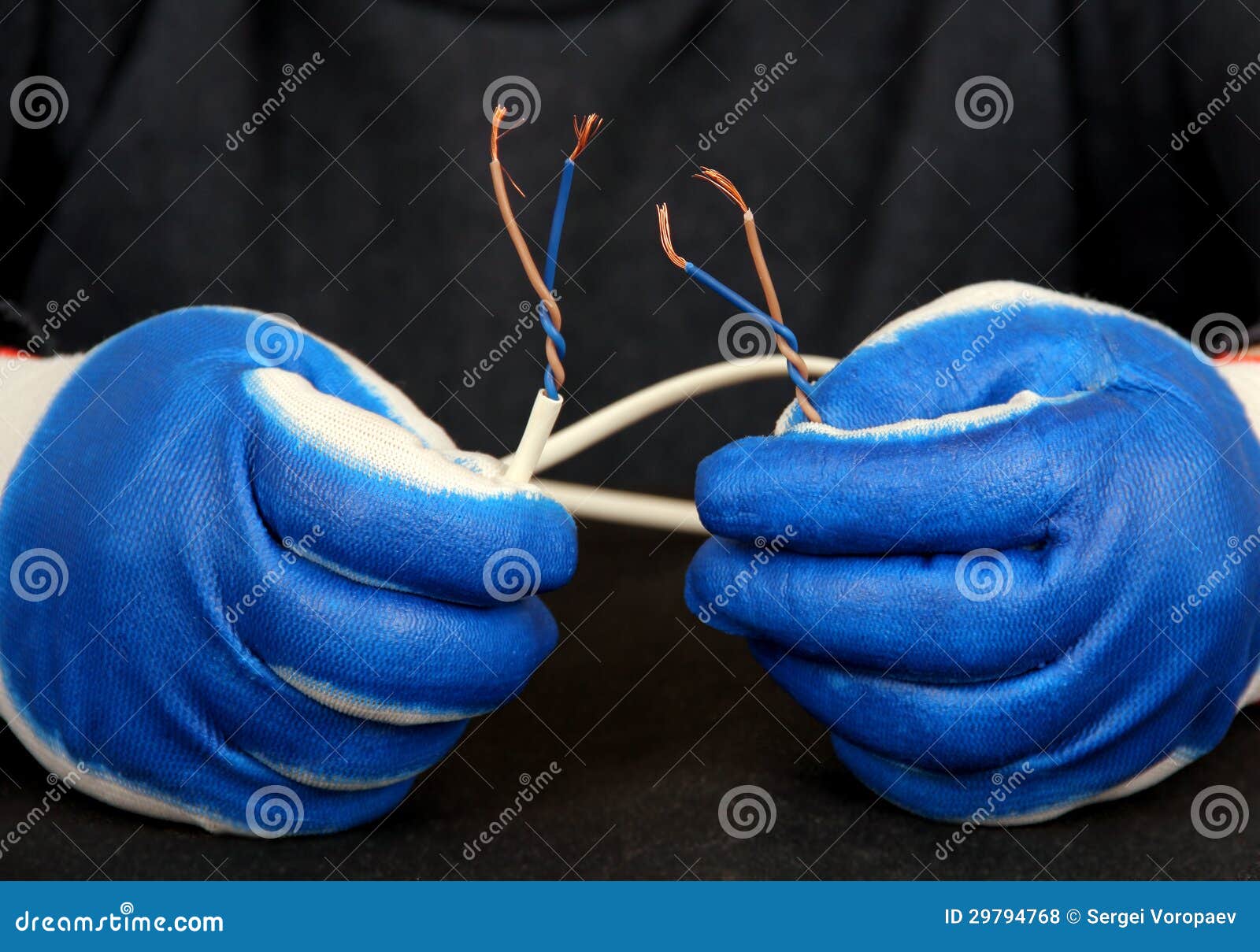 Electrical Wire in His Hands. Stock Photo - Image of cable, electrician ...