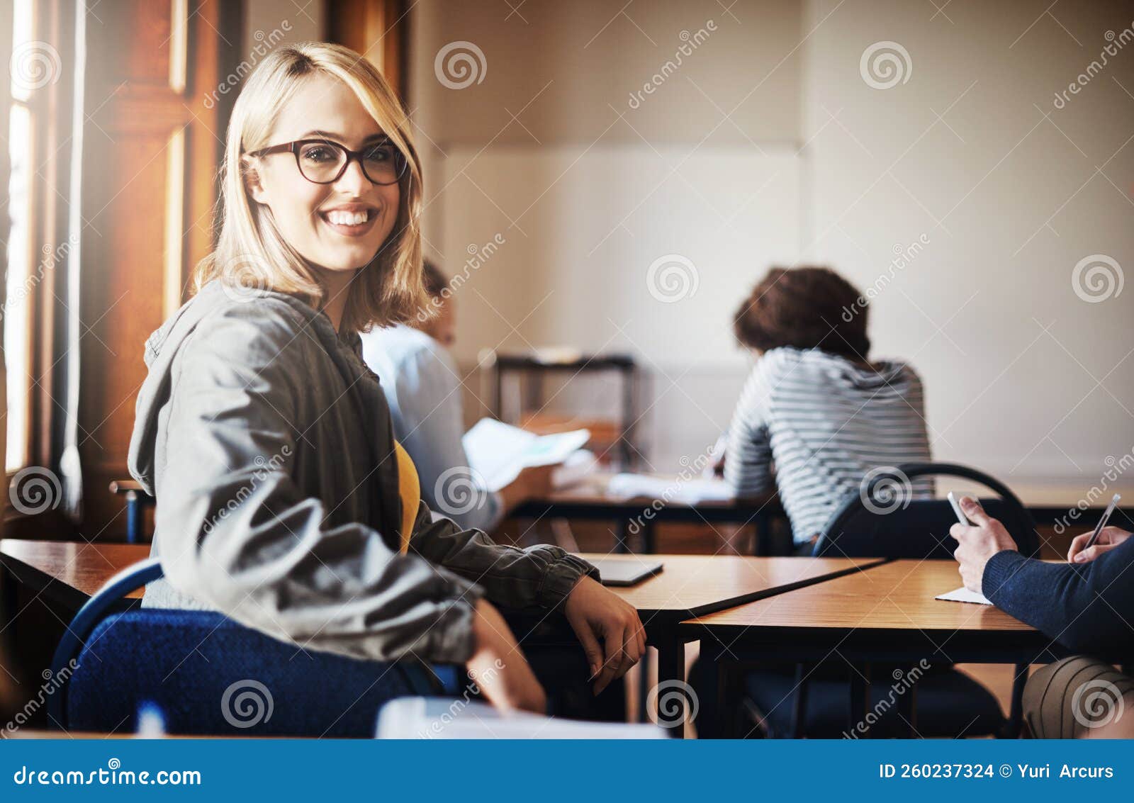 Working Hard Everyday for Their Future. University Students in Class ...