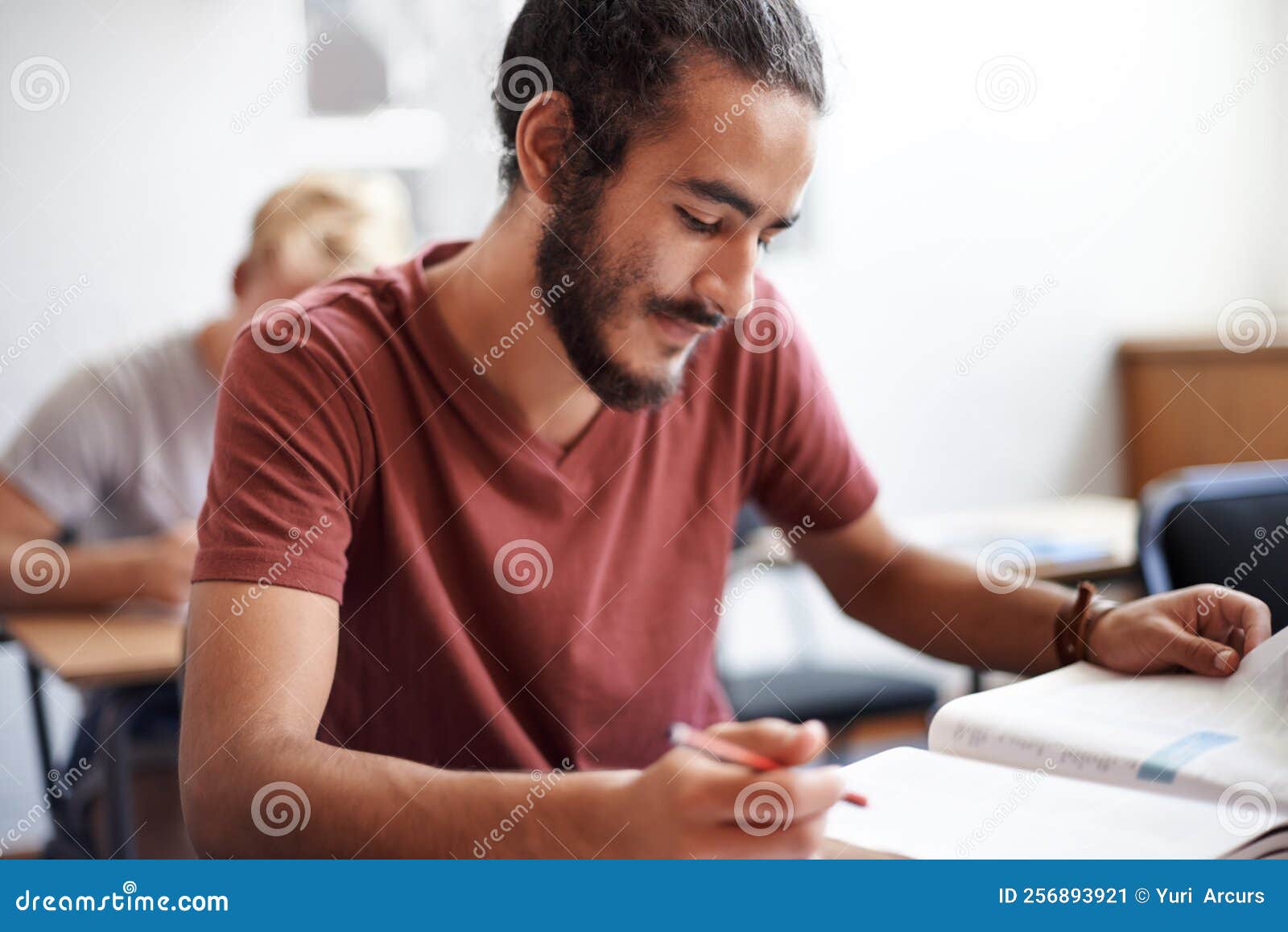 Working Hard for Good Grades. Young University Students during Class ...
