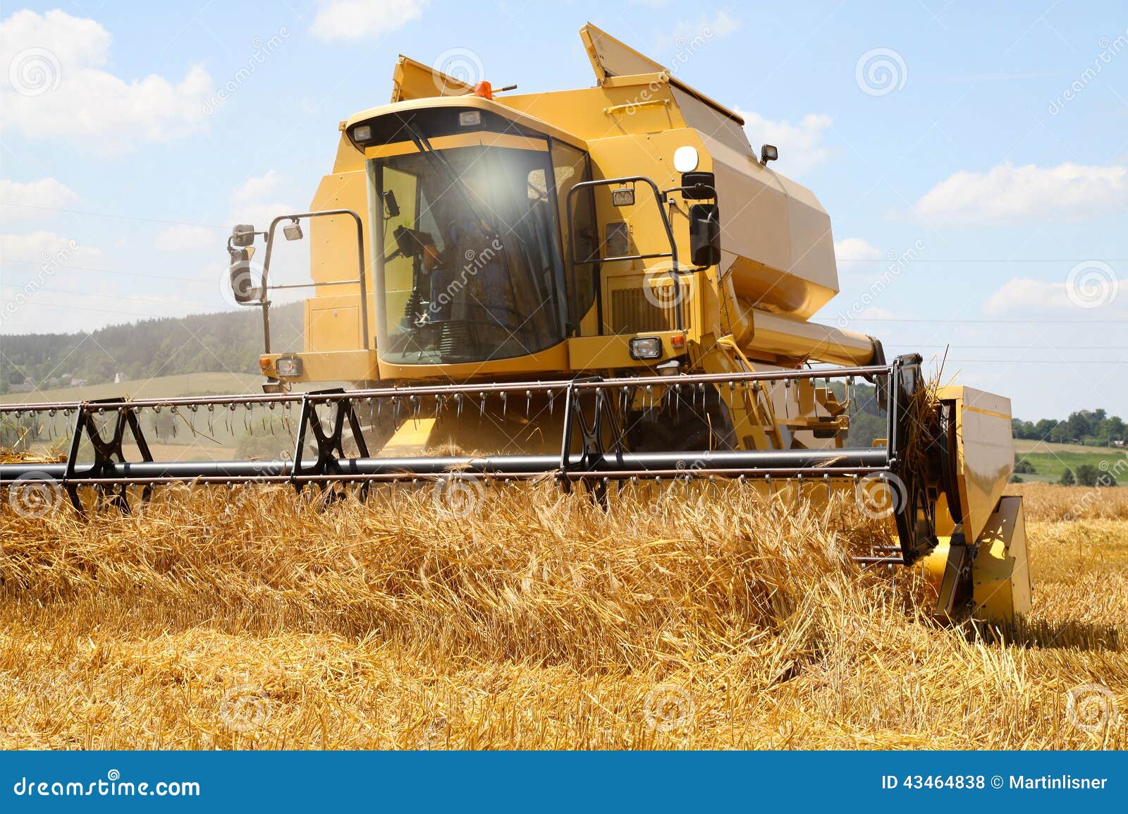 Working Harvesting Combine In The Field Of Wheat Royalty-Free Stock ...