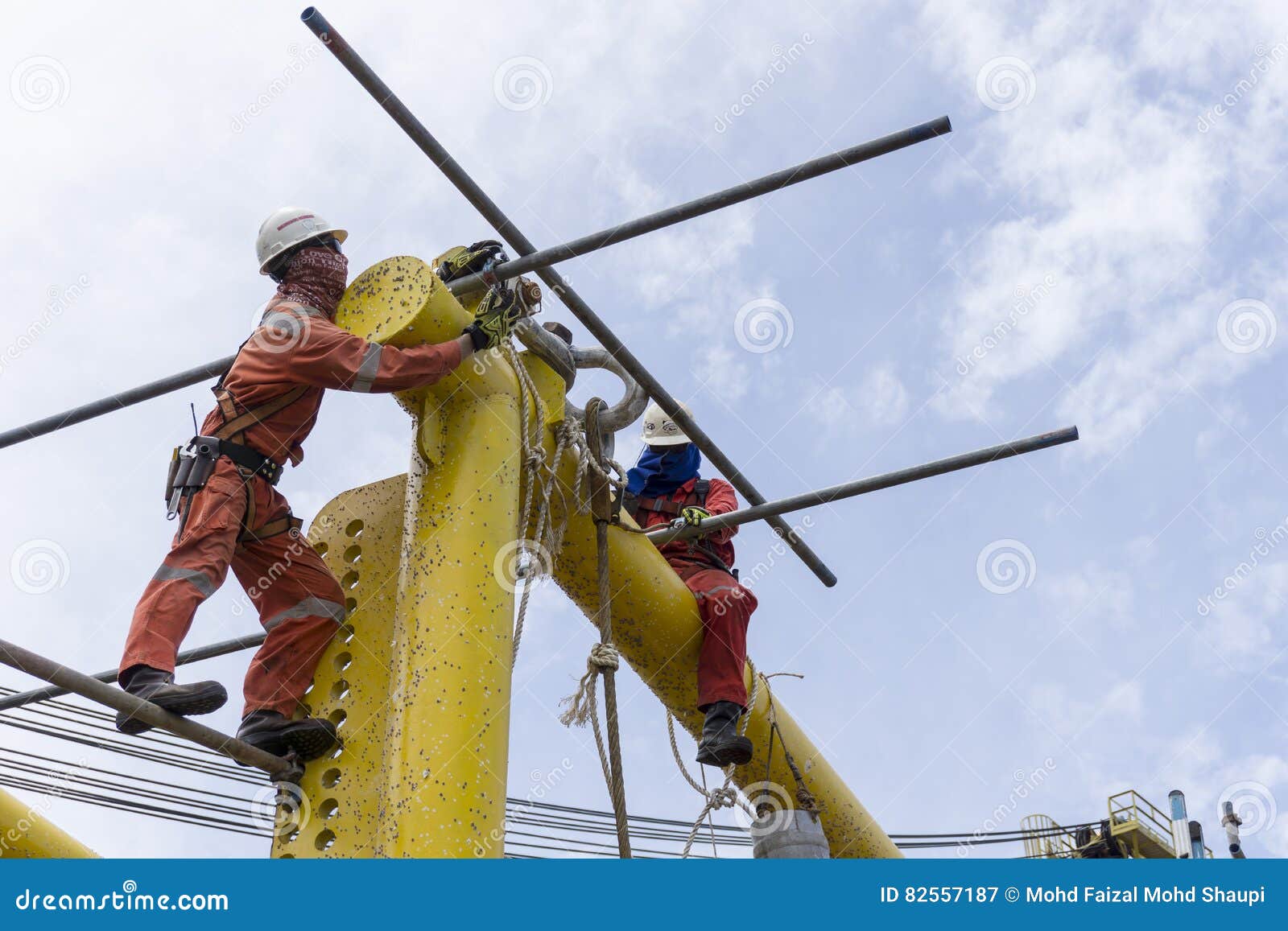 Offshore Workers On Work Boat Supply Vessel, Handling Loads To Platform ...