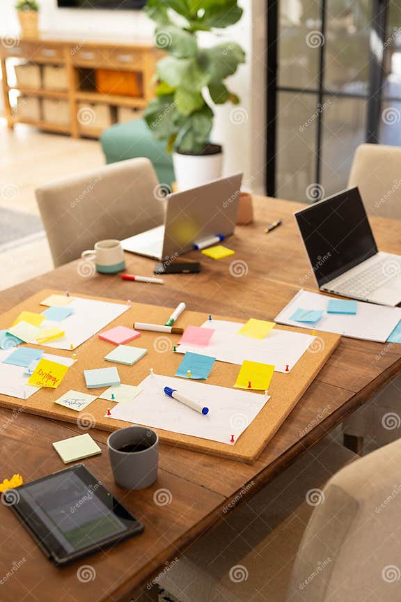 Working from Home, Laptops and Tablets on Table with Sticky Notes and ...