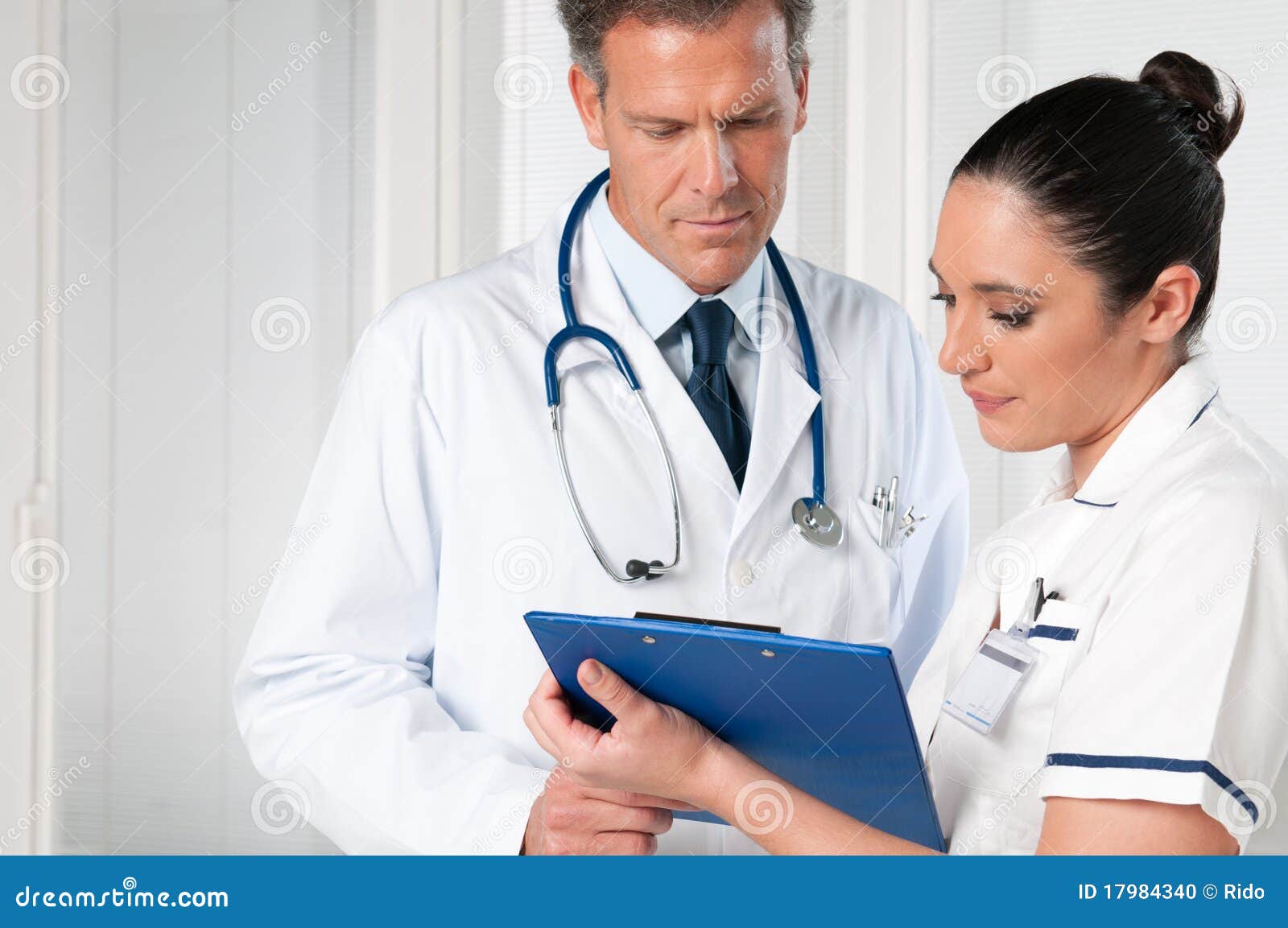 Working at hospital stock photo. Image of discussion - 17984340