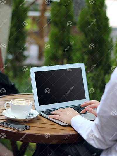Working with Laptop in Cafe Stock Photo - Image of shirt, notebook ...