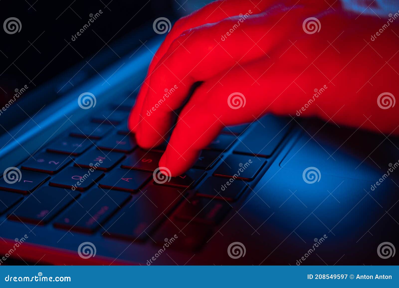 Working on a Laptop, Neon Light. Concept of Freelance, Cyber Attack ...