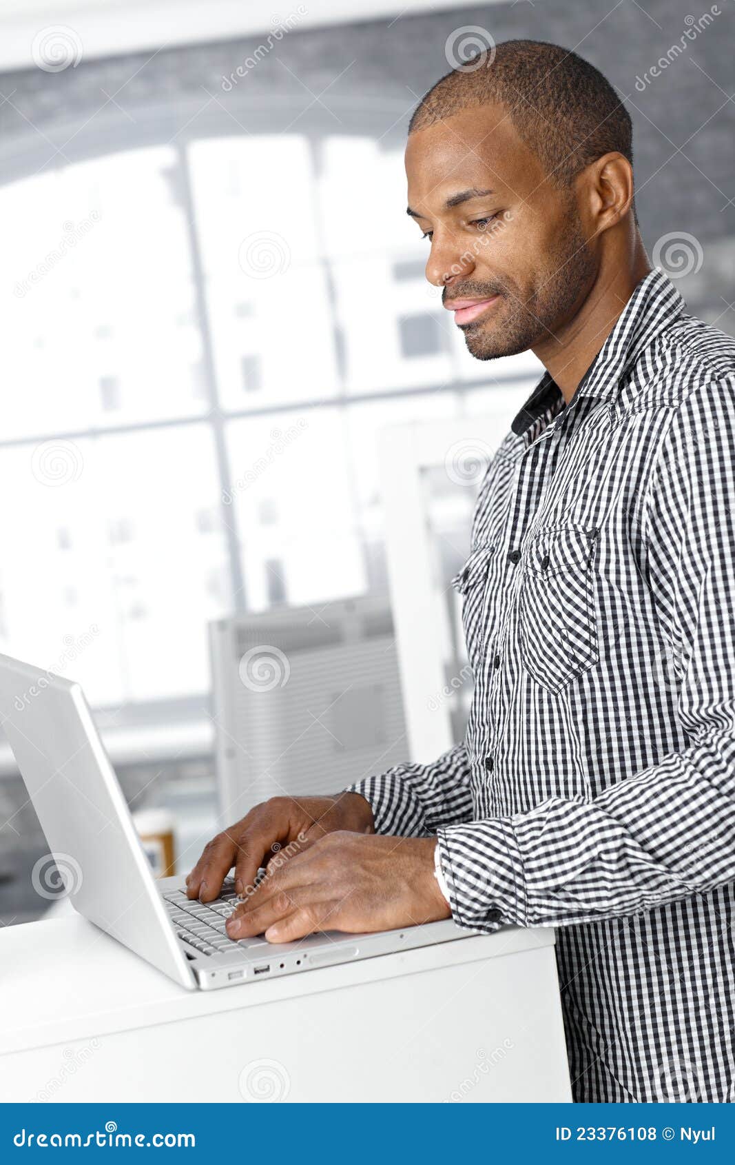 Working on Laptop in Office Stock Photo - Image of computer, male: 23376108