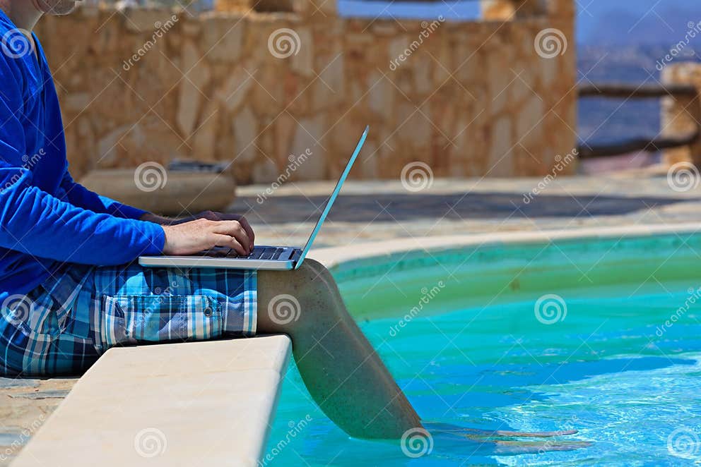 Working on Laptop at the Pool Stock Image - Image of email, laptop ...