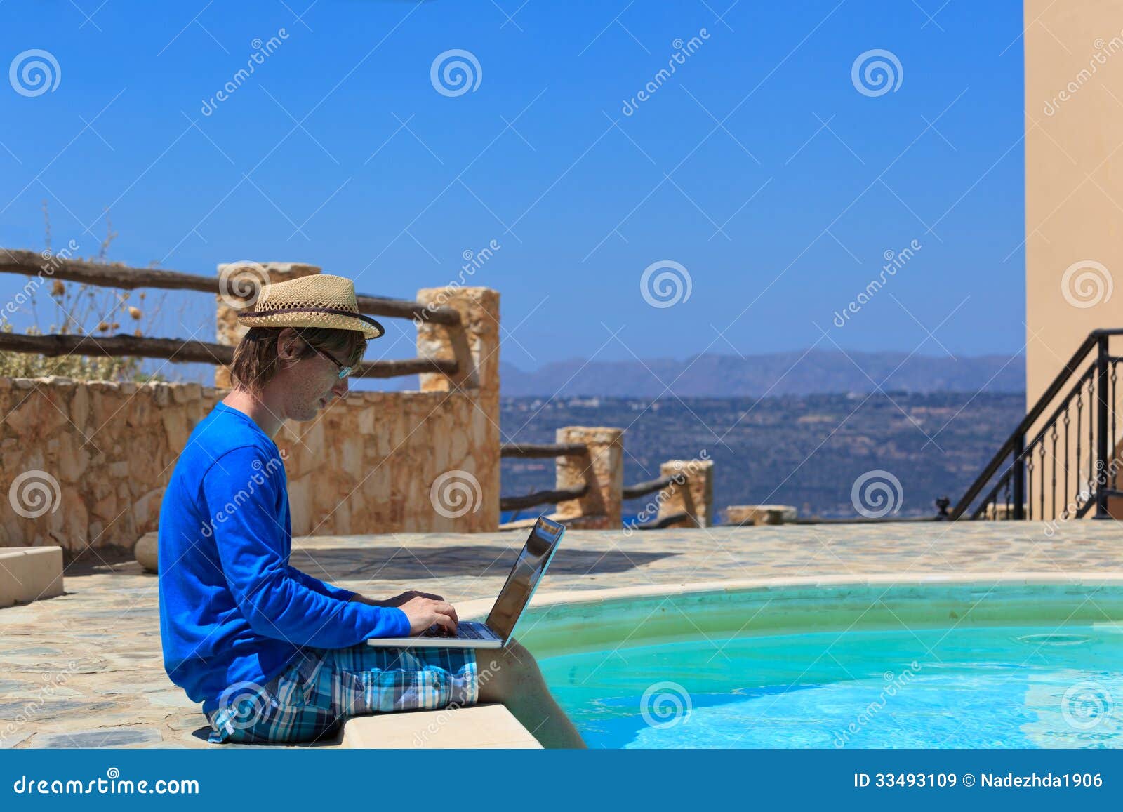 Working on Laptop at the Pool Stock Image - Image of modern, resort ...