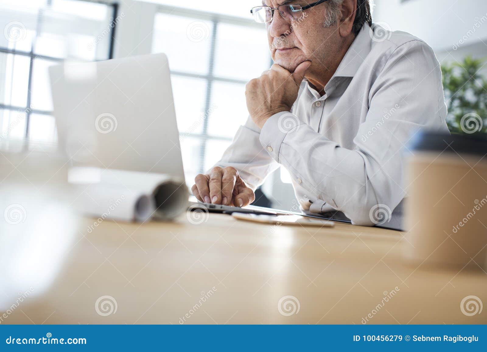 Working on laptop on table stock image. Image of coffee - 100456279