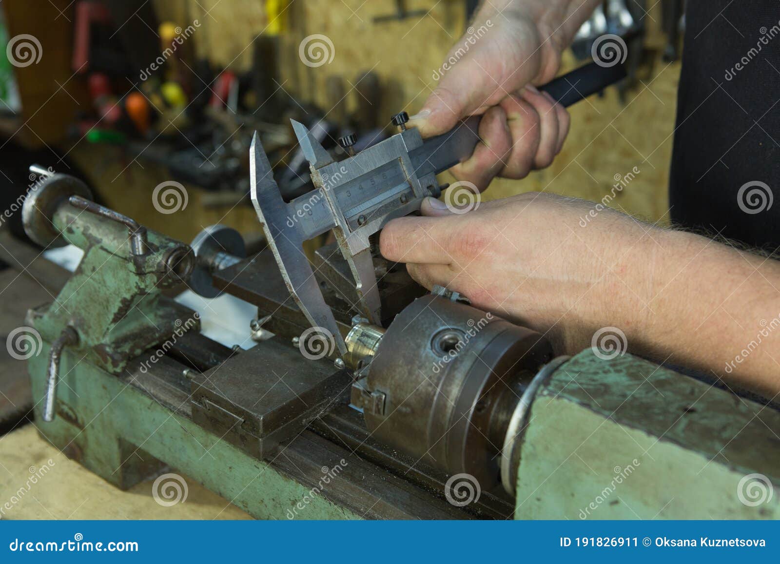 Working on a Lathe. the Machine is Ready for Work. the Wizard Checks ...