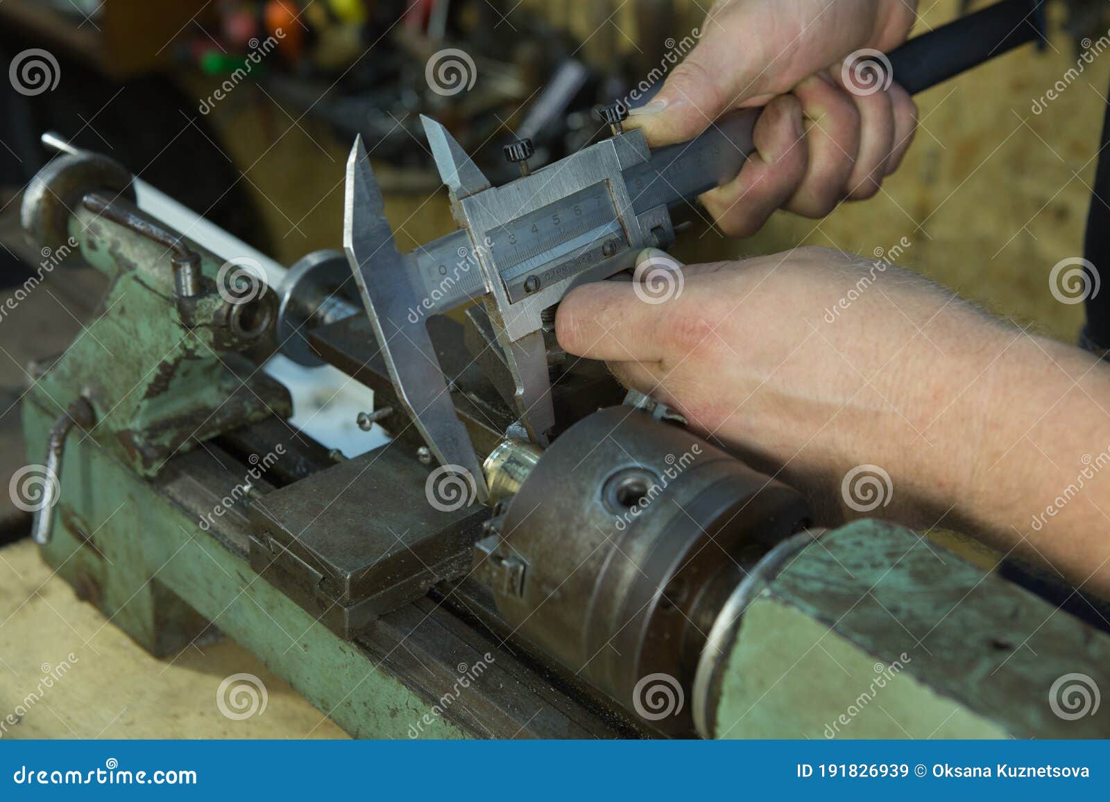 Working on a Lathe. the Machine is Ready for Work. the Wizard Checks ...