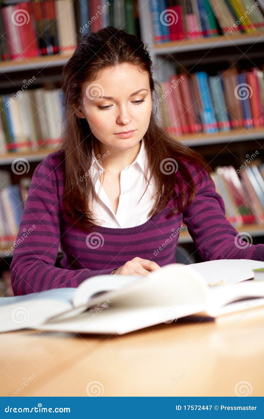 Working in library stock image. Image of beautiful, page - 17572447