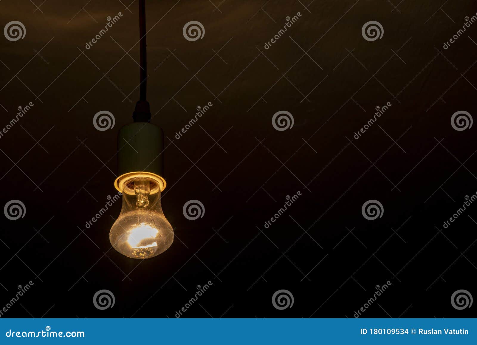 A Working Light Bulb, Light in the Dark, Background for Authors. Stock ...