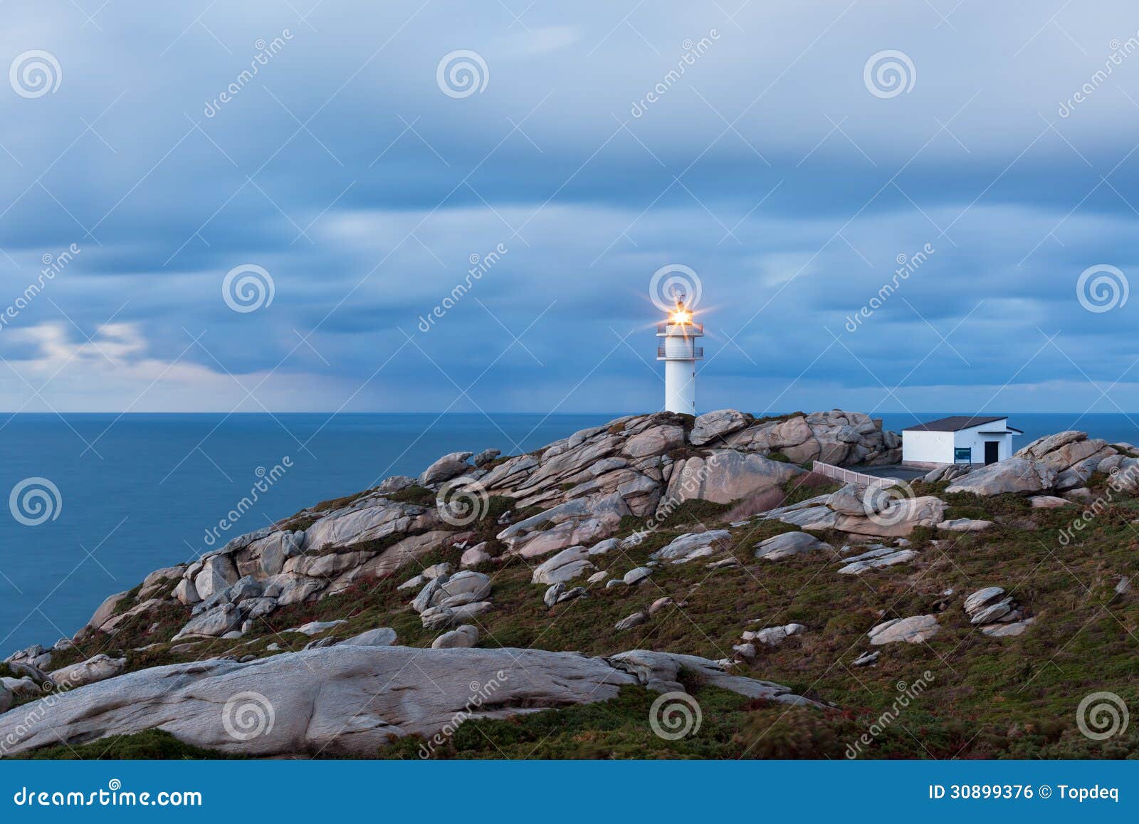 Working Lighthouse at Northern Spain in Bad Weather Stock Photo - Image ...