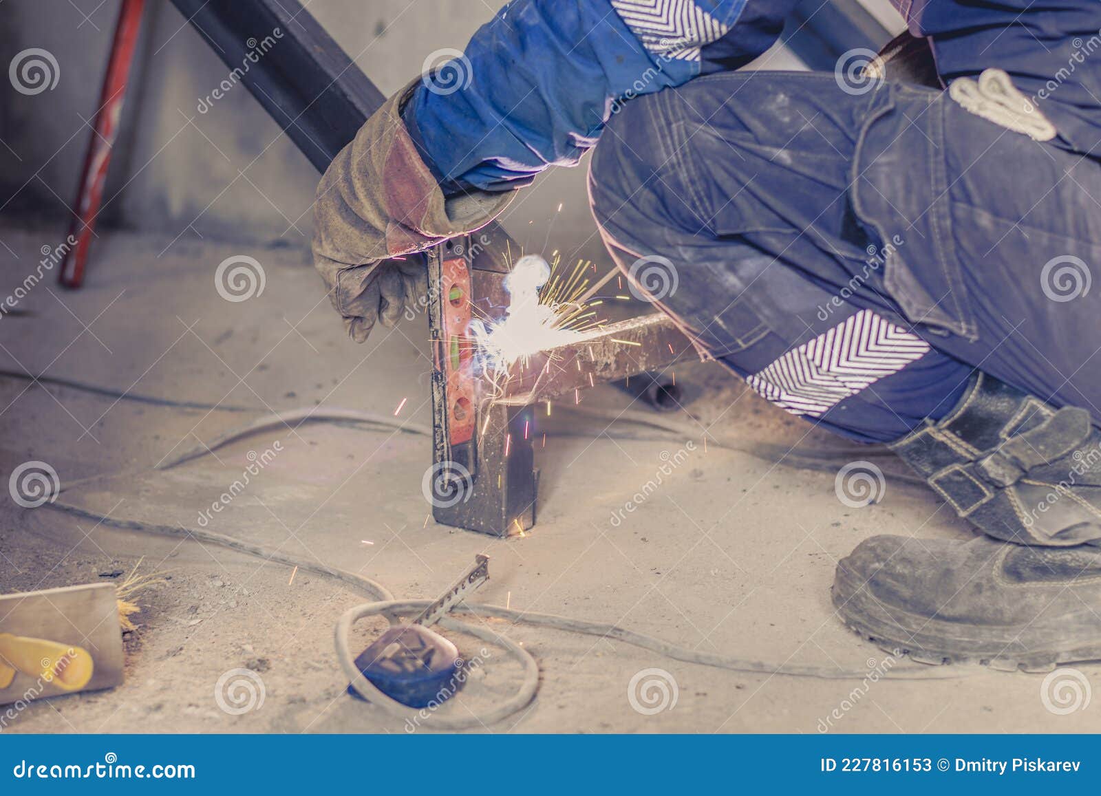 Man Welder Assembles a Metal Staircase Structure in a Residential ...