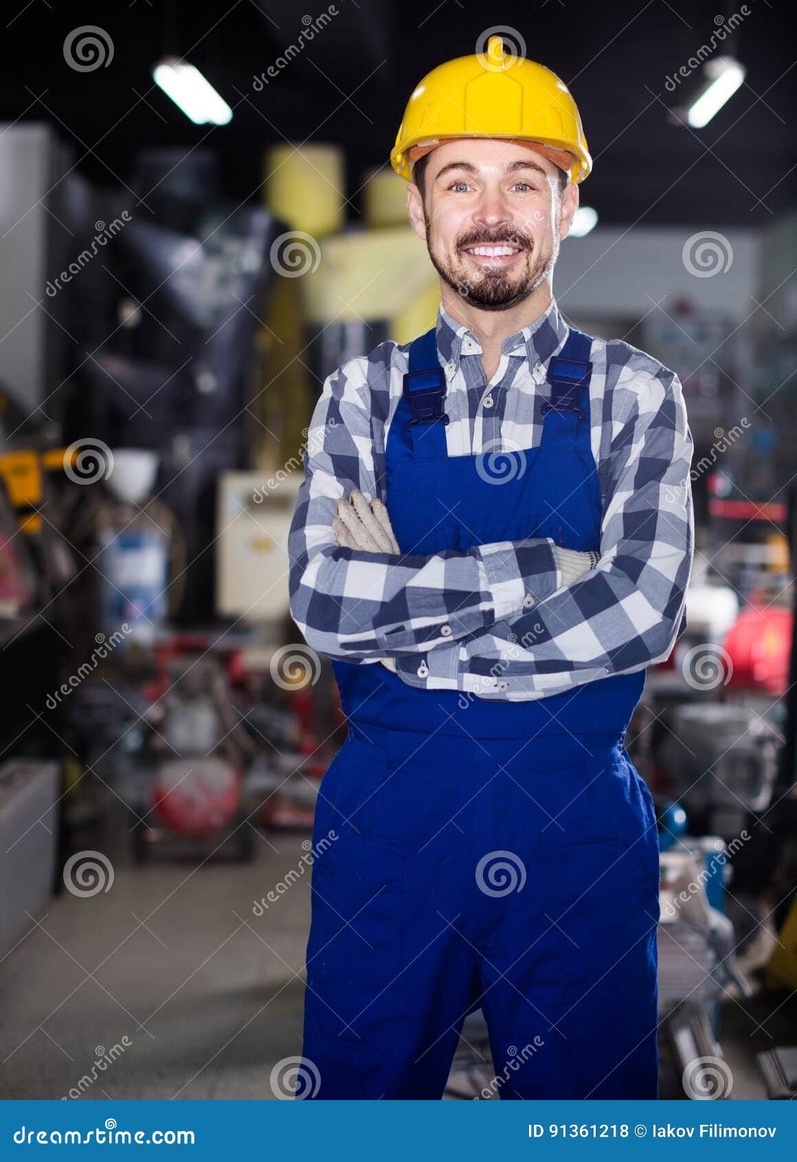 Working Man Demonstrating His Workplace and Tools at Workshop Stock ...