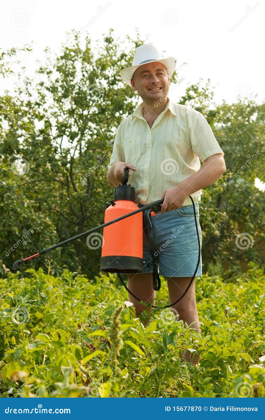 Working Man with Garden Spray Stock Photo - Image of spring, spray ...