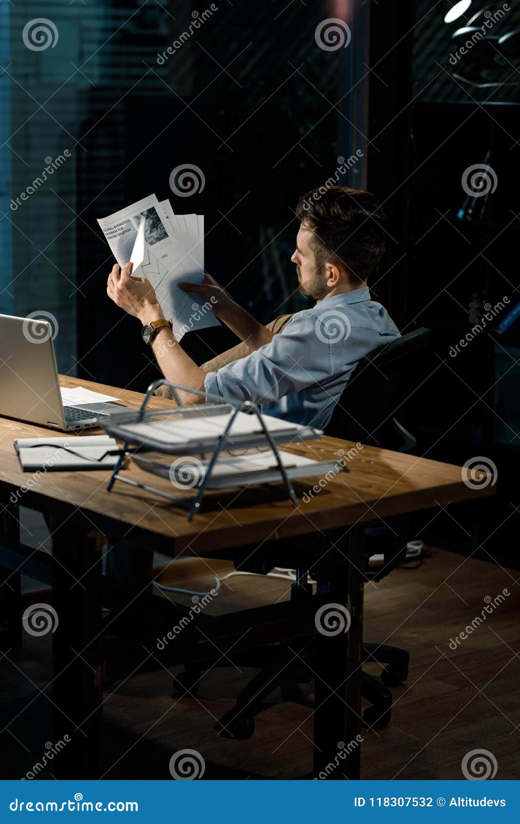 Working Man with Papers at Table Stock Photo - Image of education ...