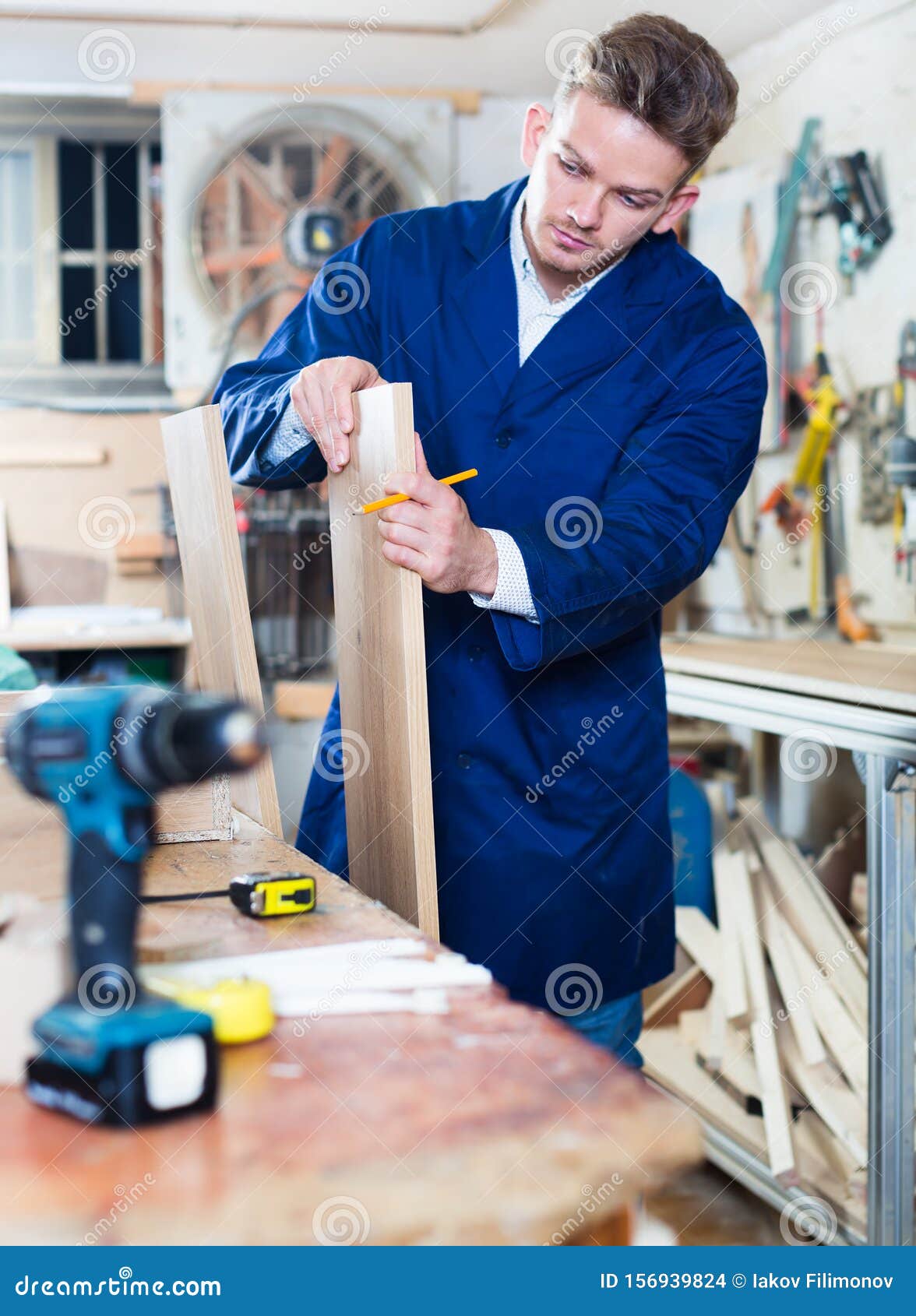 Working Man Preparing Chipboard for Work Stock Photo - Image of ...