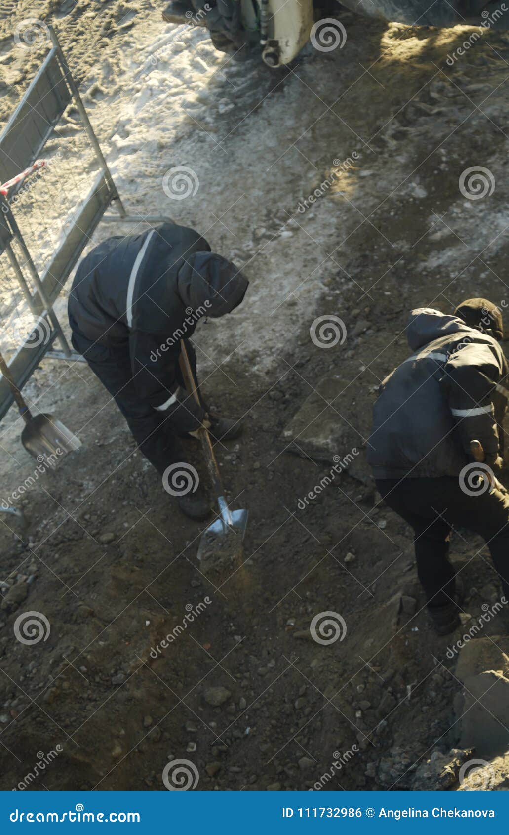 Working Men in the Form of Standing Around a Sand Pit Editorial Photo ...