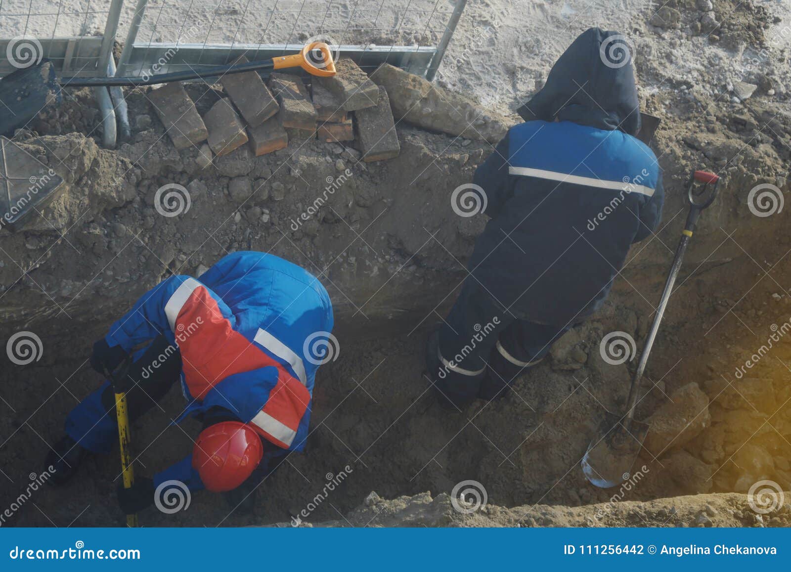 Working Men in the Form of Standing Around a Sand Pit Stock Photo ...
