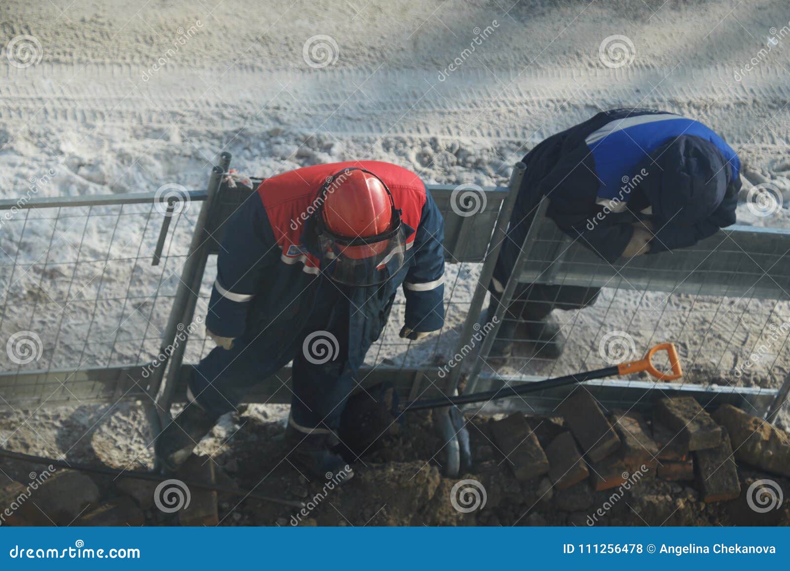 Working Men in the Form of Standing Around a Sand Pit Stock Photo ...