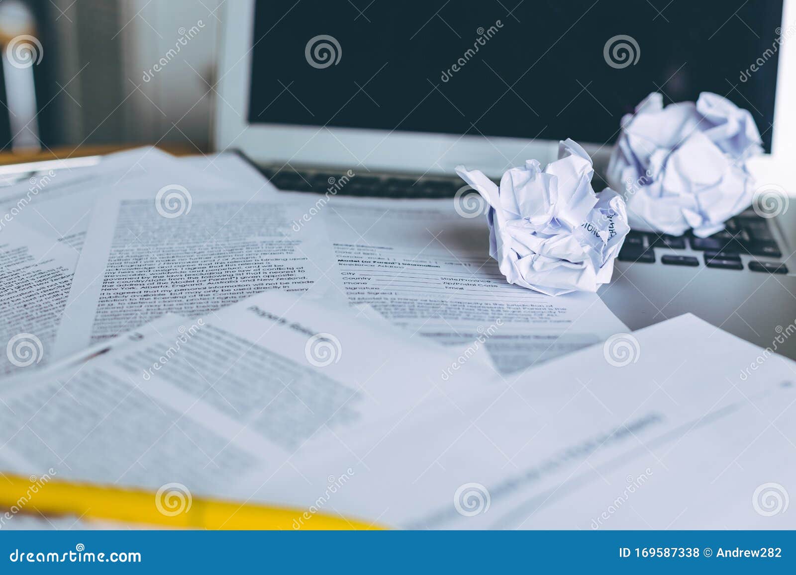 Working Mess with Crumpled Papers, Laptop and Different Papers on ...