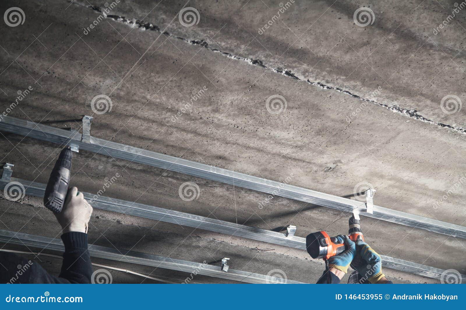 Working with a Metal Profile of a Ceiling Construction Stock Image ...
