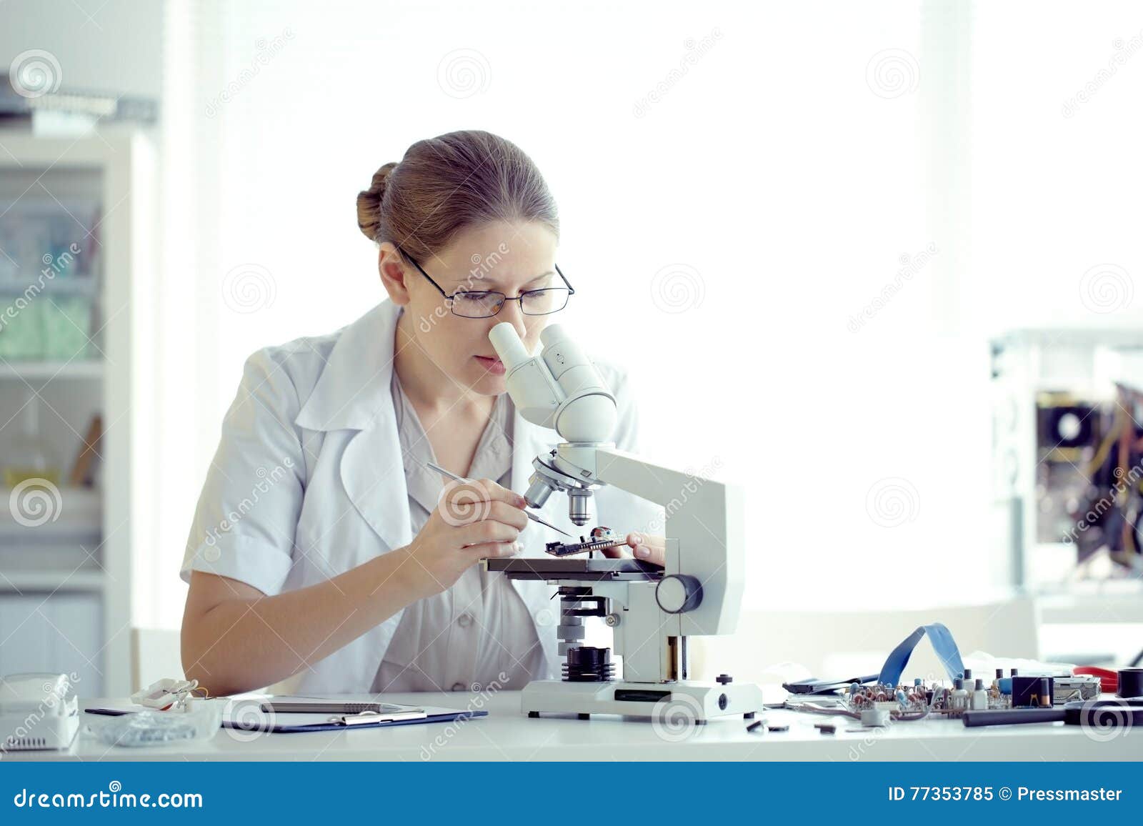 Working with microscope stock image. Image of repair - 77353785