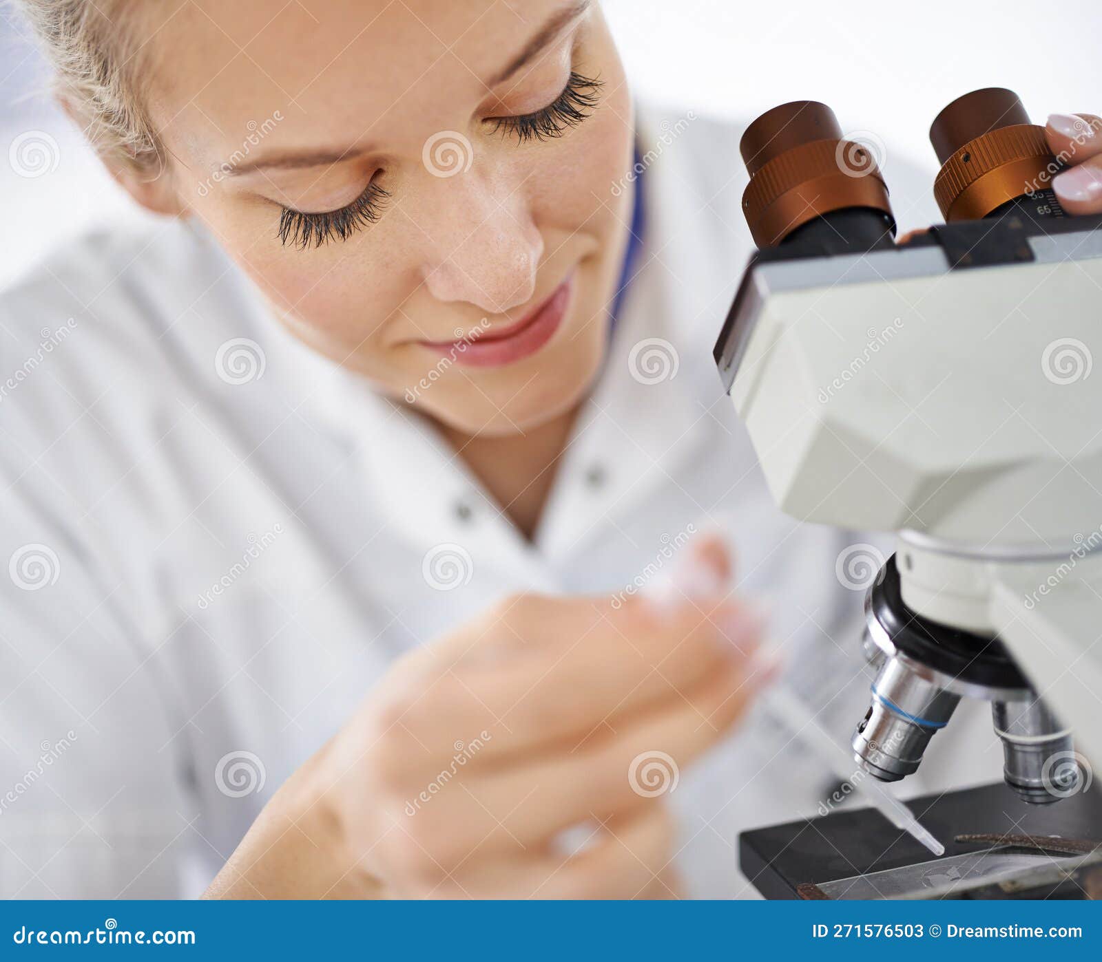 Working on that Miracle Cure. a Beautiful Woman in a Laboratory Working ...