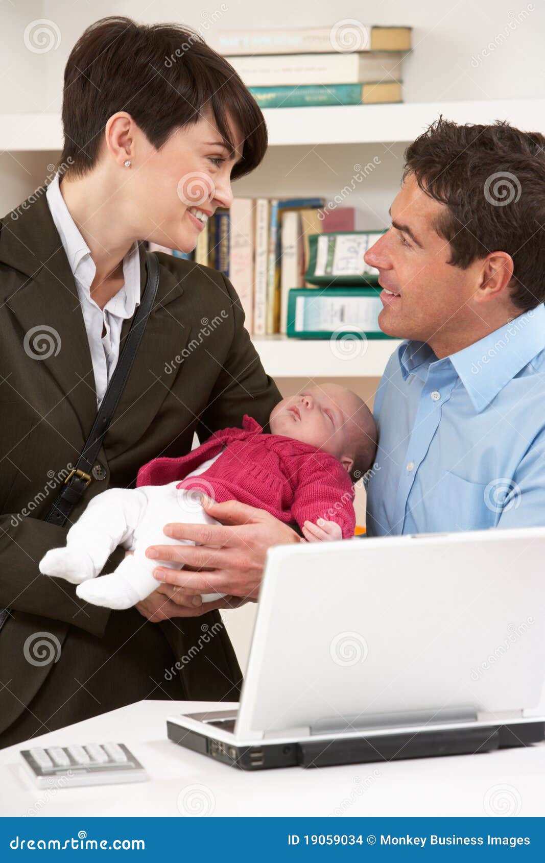 Working Mother Leaving Baby with Father Stock Photo - Image of ...
