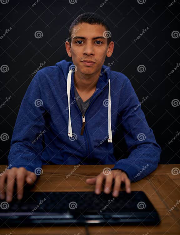 Working on a New Game. a Young Programmer Focused on His Work. Stock ...