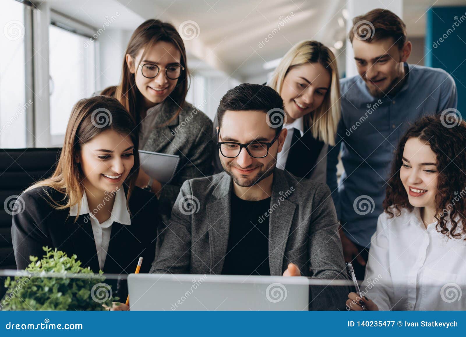 Working with New Project. Beautiful Business People are Using Computers ... Working with New Project. Beautiful Business People are Using Computers ...