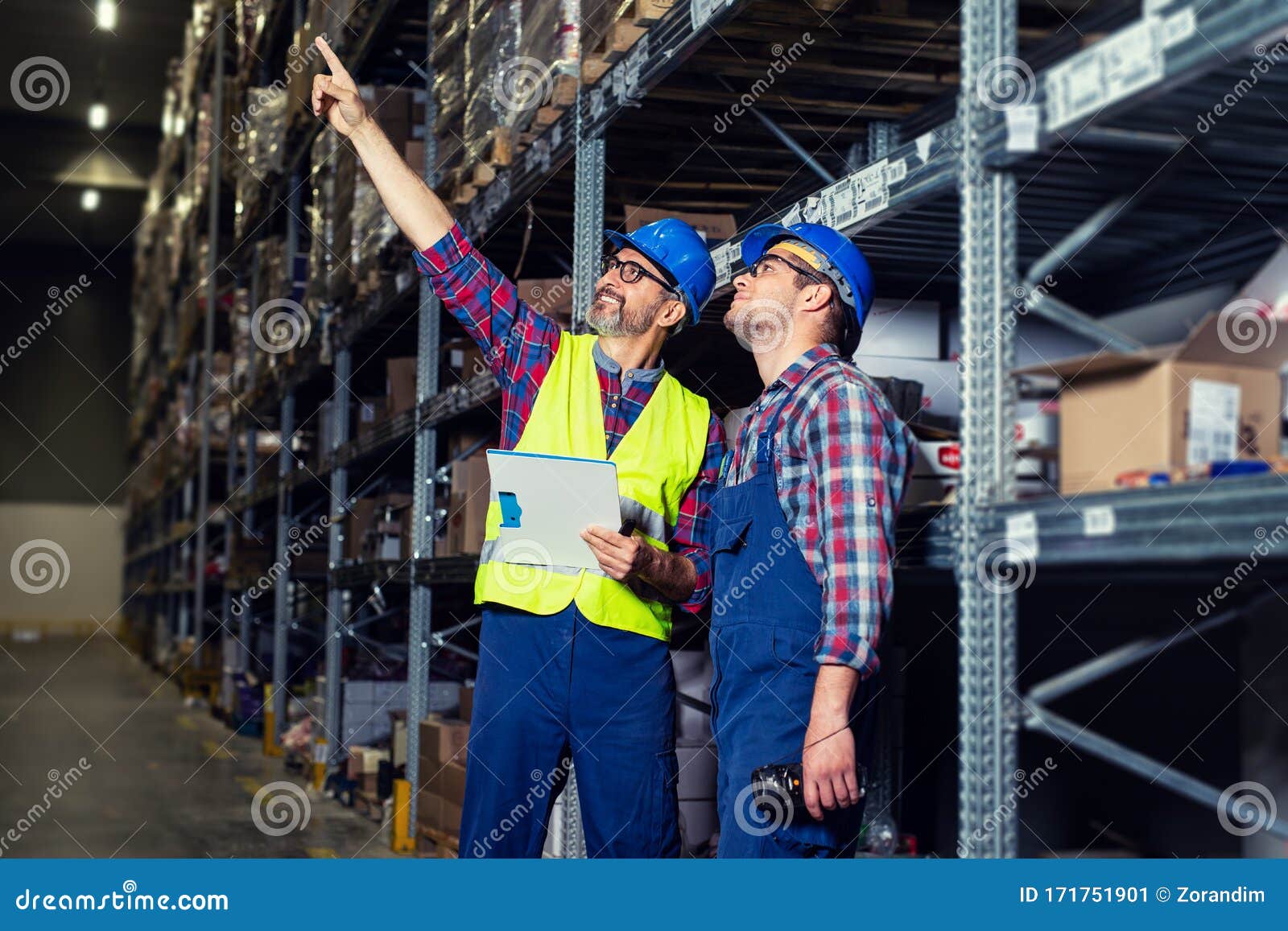 Working in Warehouse, Managers and Workers Checking Inventory. Stock ...