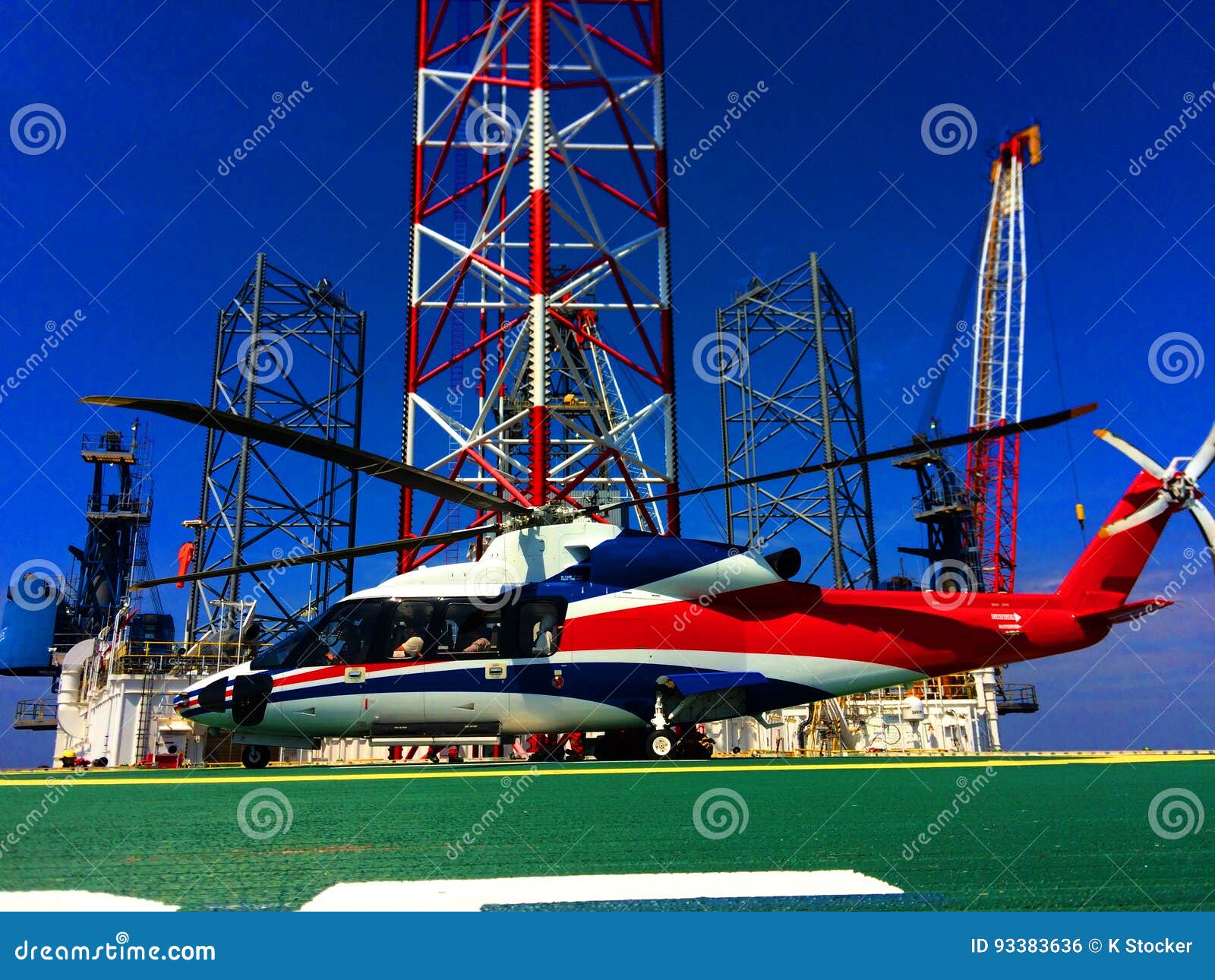 Working Offshore,the Helicopter Landed on the Rig, Sea, Changing Stock ...