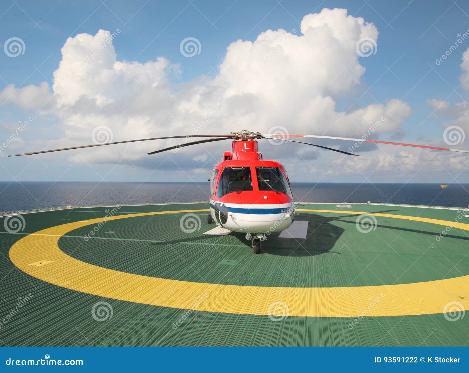 Working Offshore,the Helicopter Landed on the Rig, Sea, Changing Stock ...