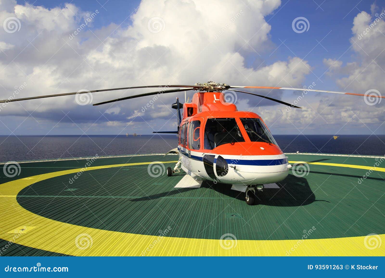 Helicopter Landed At Top Of Deck At Offshore Oil And Gas Platform ...