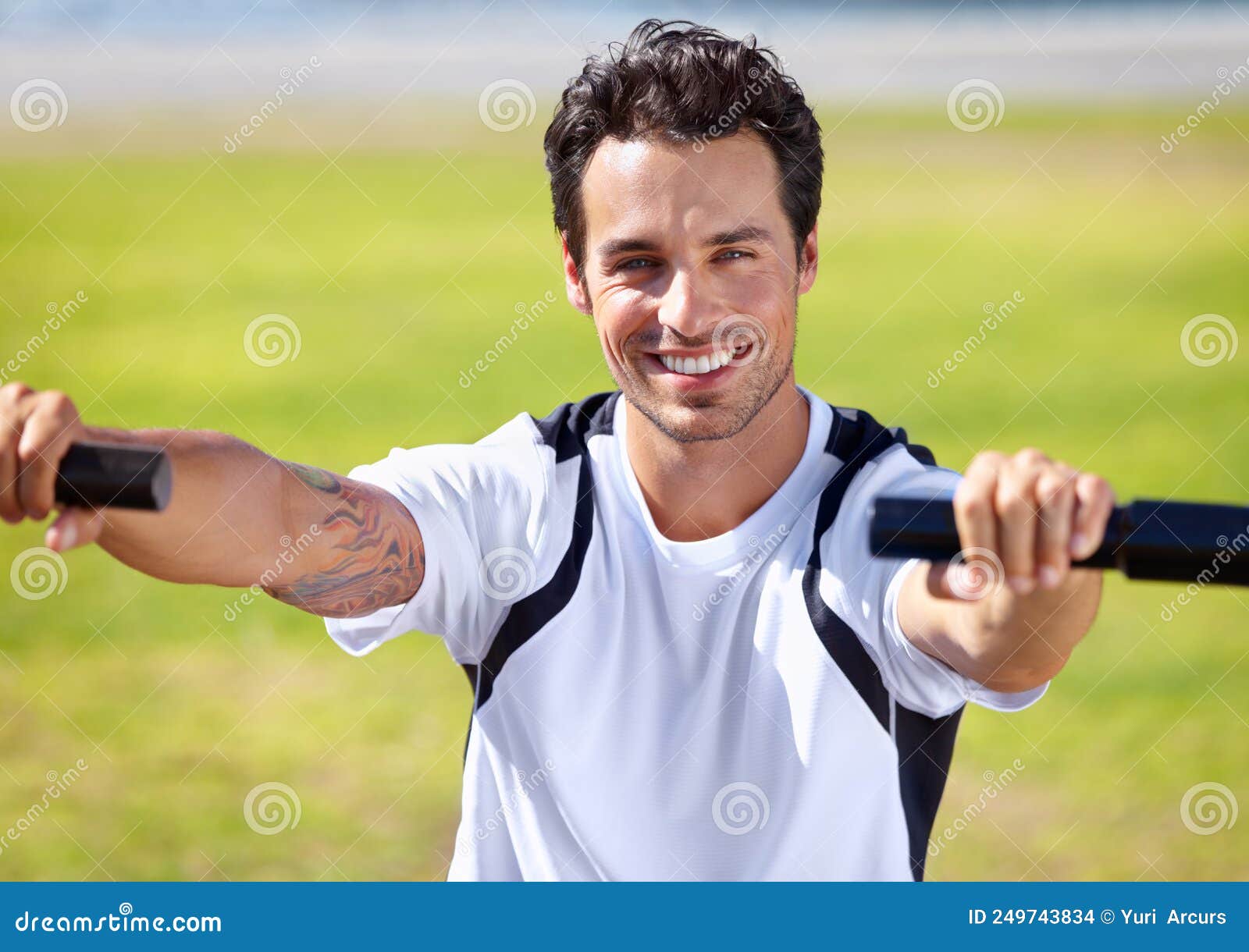 Working Out and Getting Some Sun. Shot of a Handsome Young Man ...