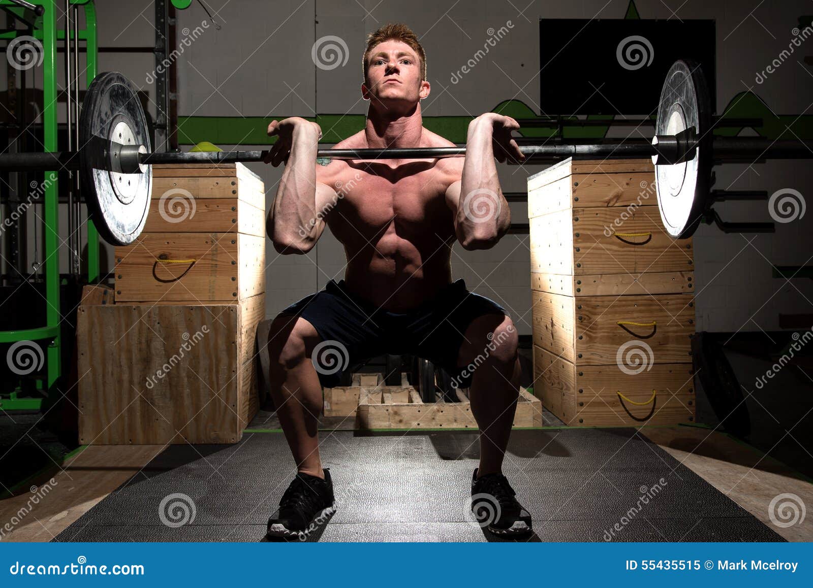 Working Out Hard in Dramatic Light Stock Image - Image of lifting, feel ...