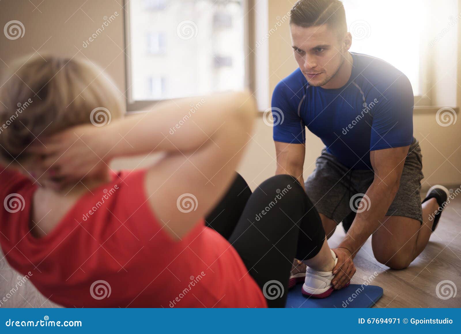 Working out with trainer stock image. Image of health - 67694971
