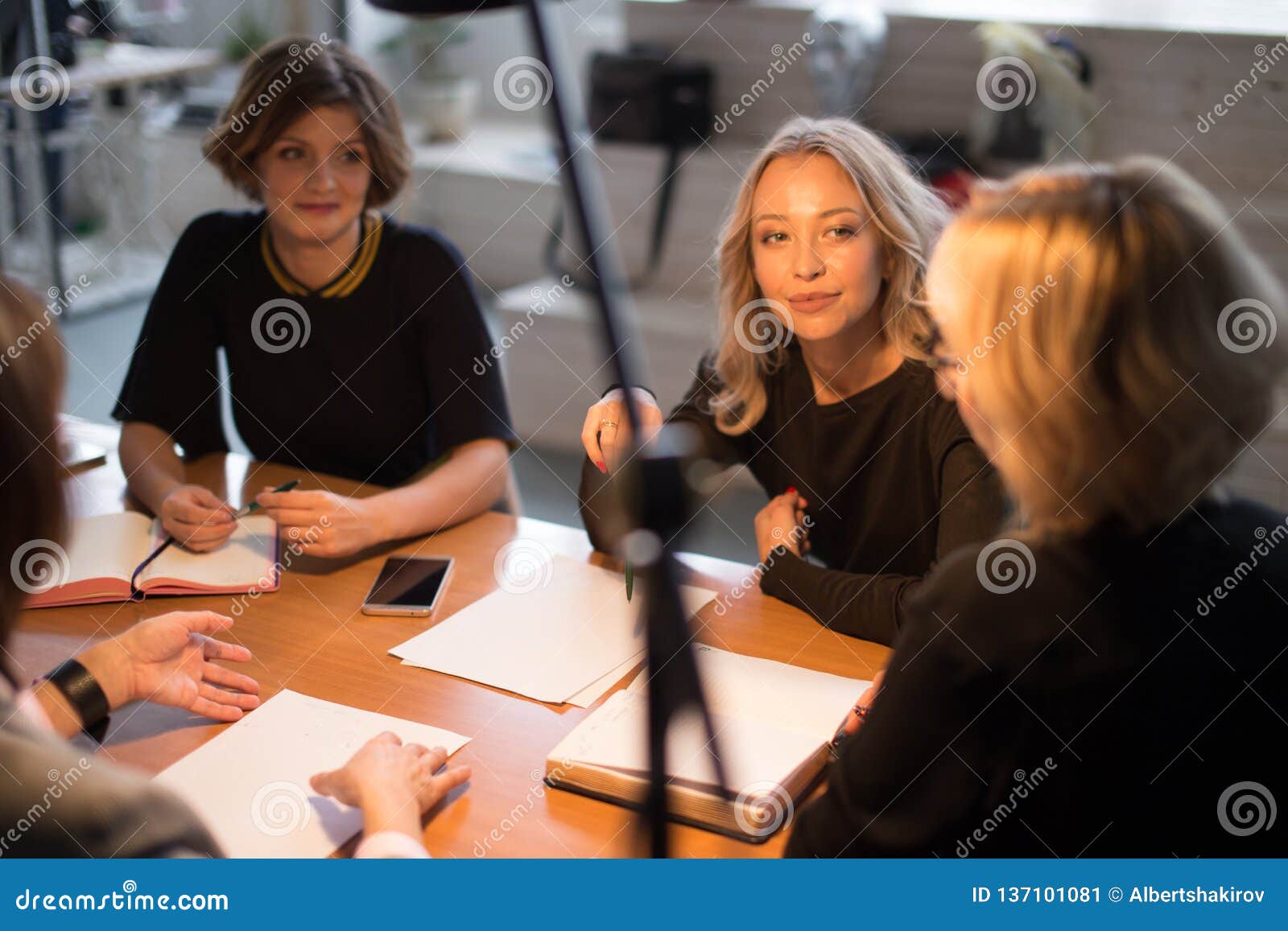 Working Overtime Concept. Group of Female Business Team Working Late at ... Working Overtime Concept. Group of Female Business Team Working Late at ...